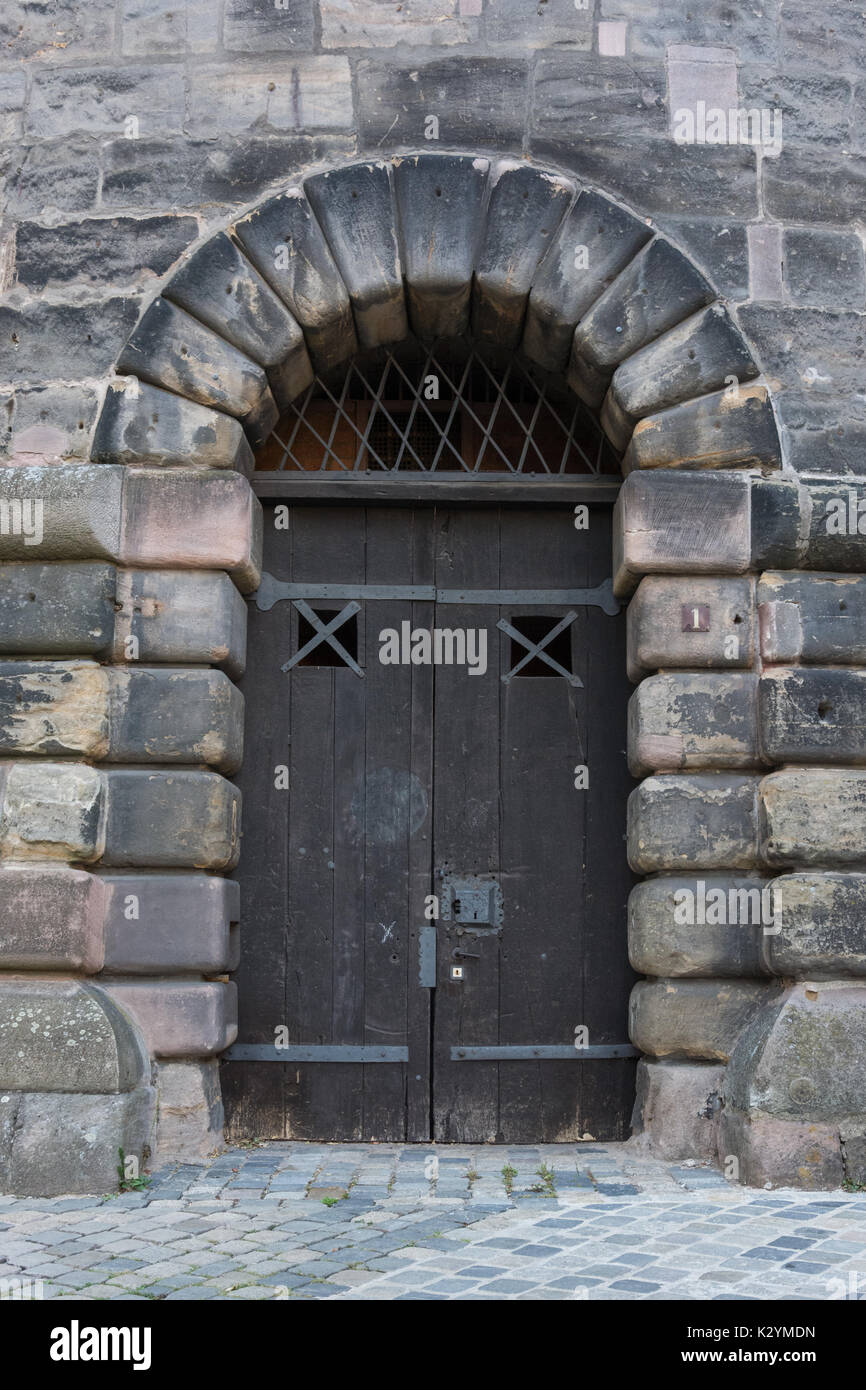 Old brown wooden door of a medieval tower in Nuremberg Stock Photo - Alamy