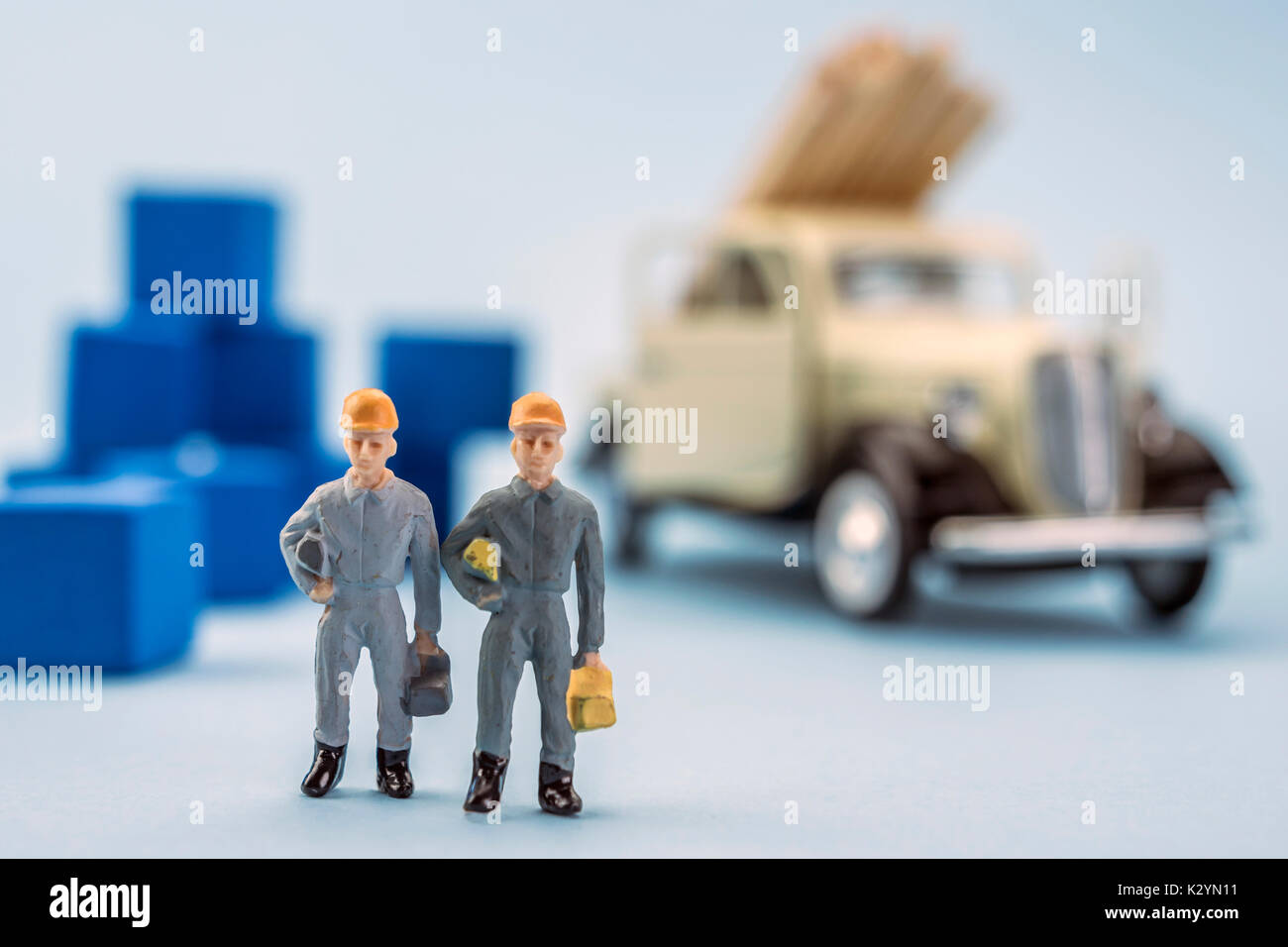 Miniature workers, concept of teamwork Stock Photo - Alamy