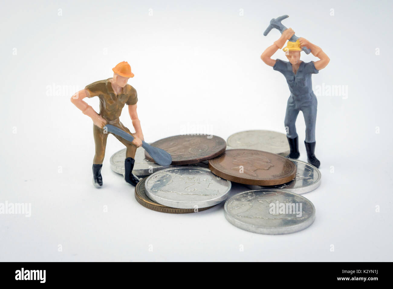 Miniature workers, concept of teamwork Stock Photo - Alamy