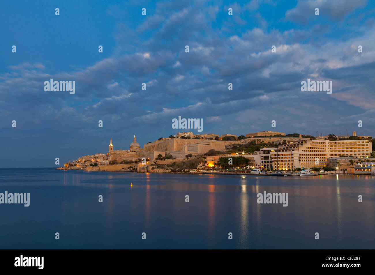 Summer amazing night view of Valetta profile over sea. Long exposure ...