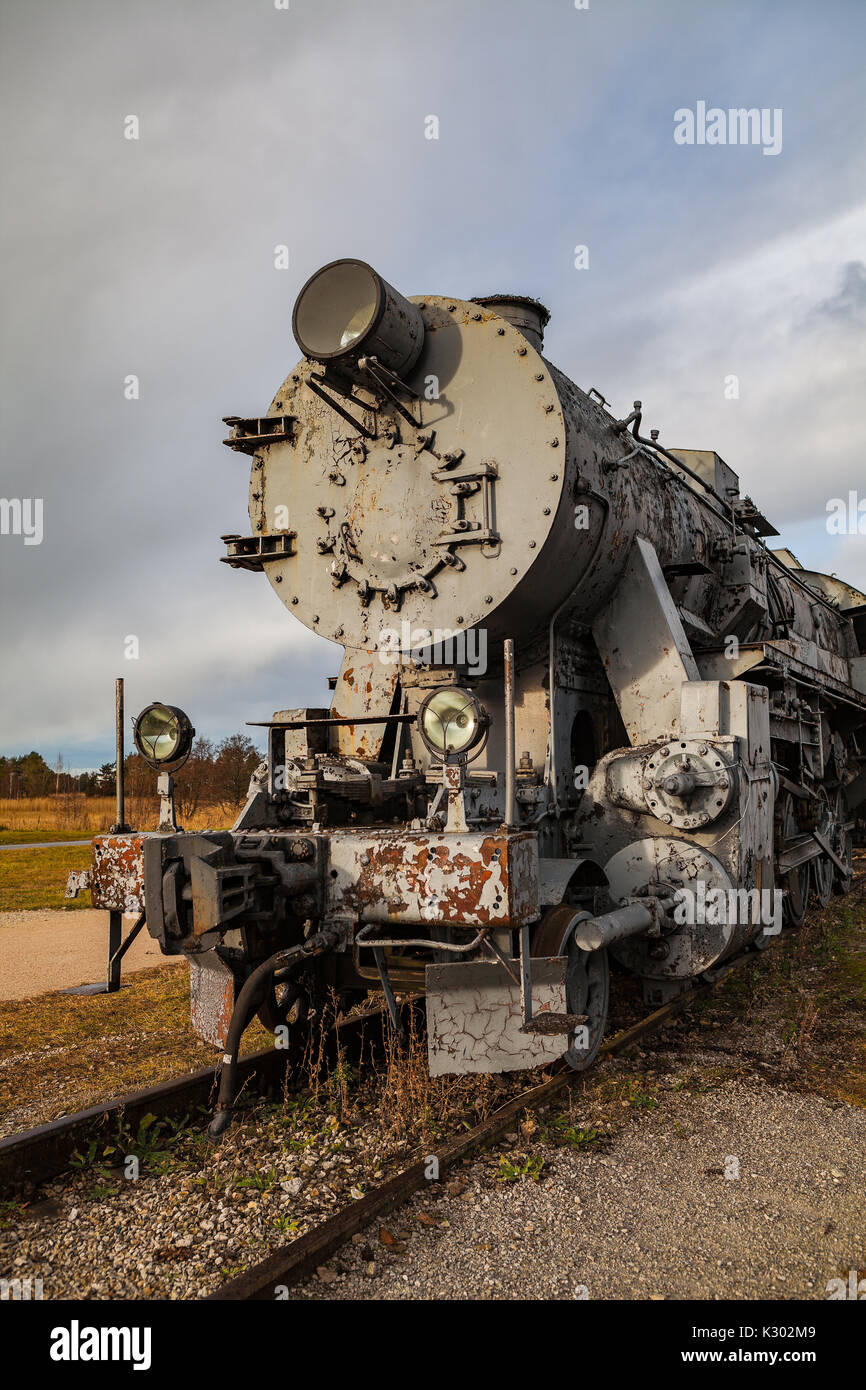 Old vintage steam locomotive from XX century, grey color. Russian ...