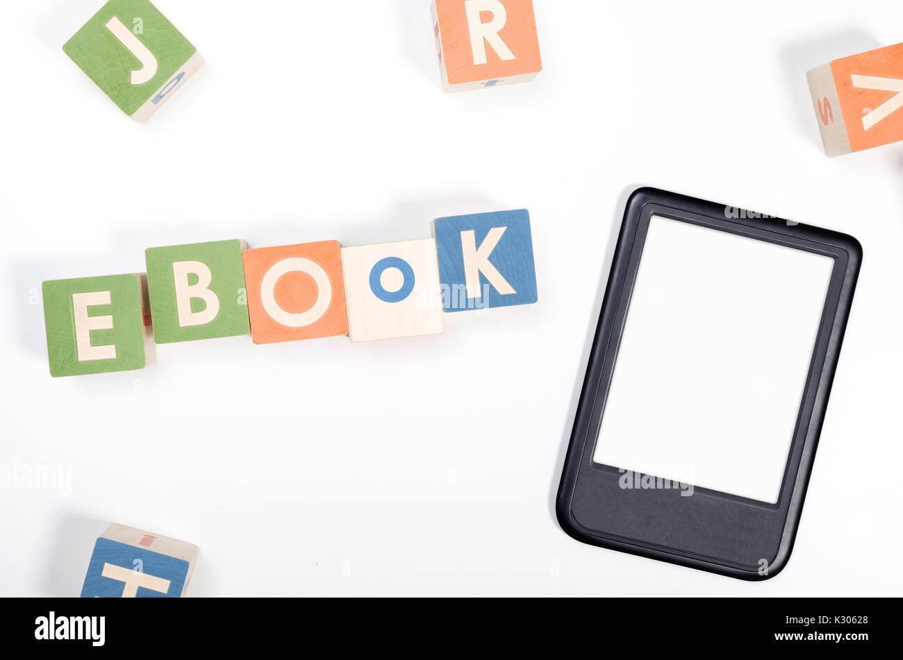 e-book reader device and toy blocks top view concept Stock Photo - Alamy