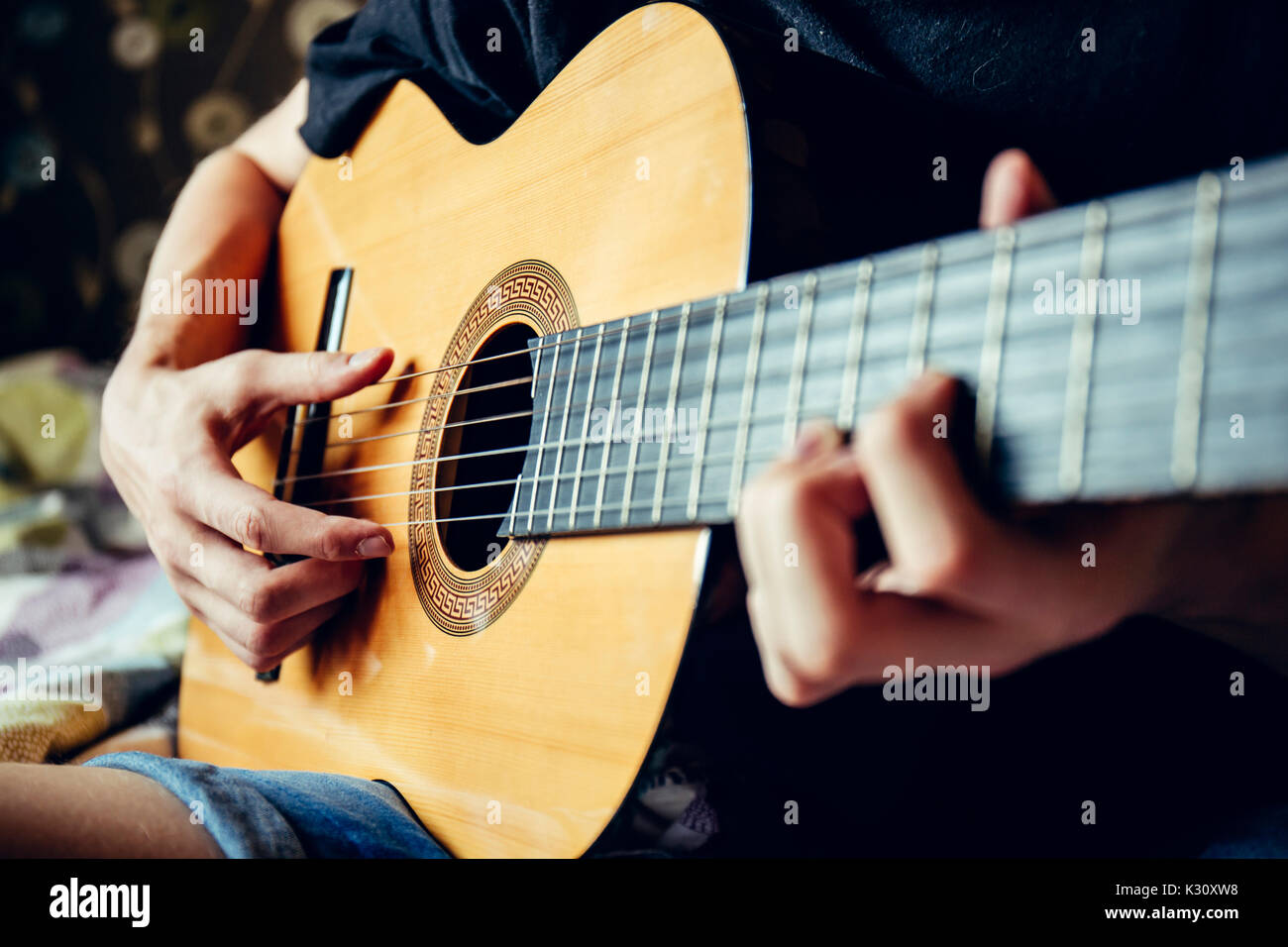 musician playing acoustic guitar, live music background Stock Photo - Alamy