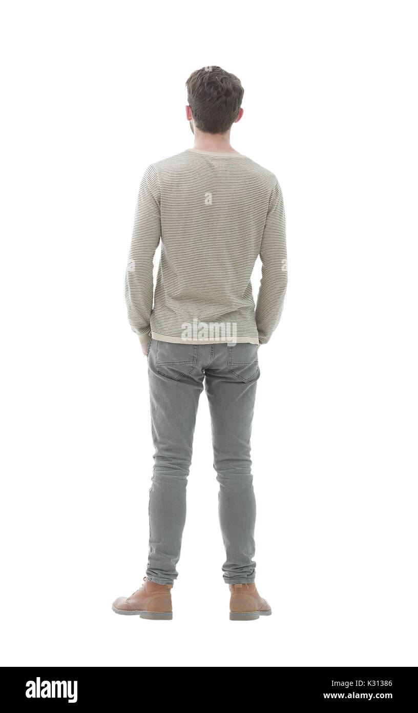 Rear view. Full length. Young man in gray sweater Stock Photo - Alamy