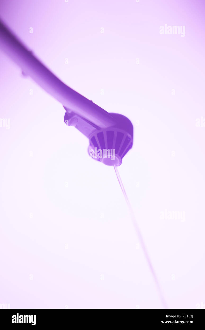 Dental water spray cleaner for interdental hygiene Stock Photo - Alamy