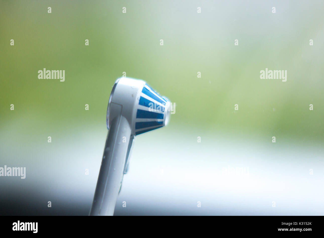 Dental water spray cleaner for interdental hygiene Stock Photo - Alamy