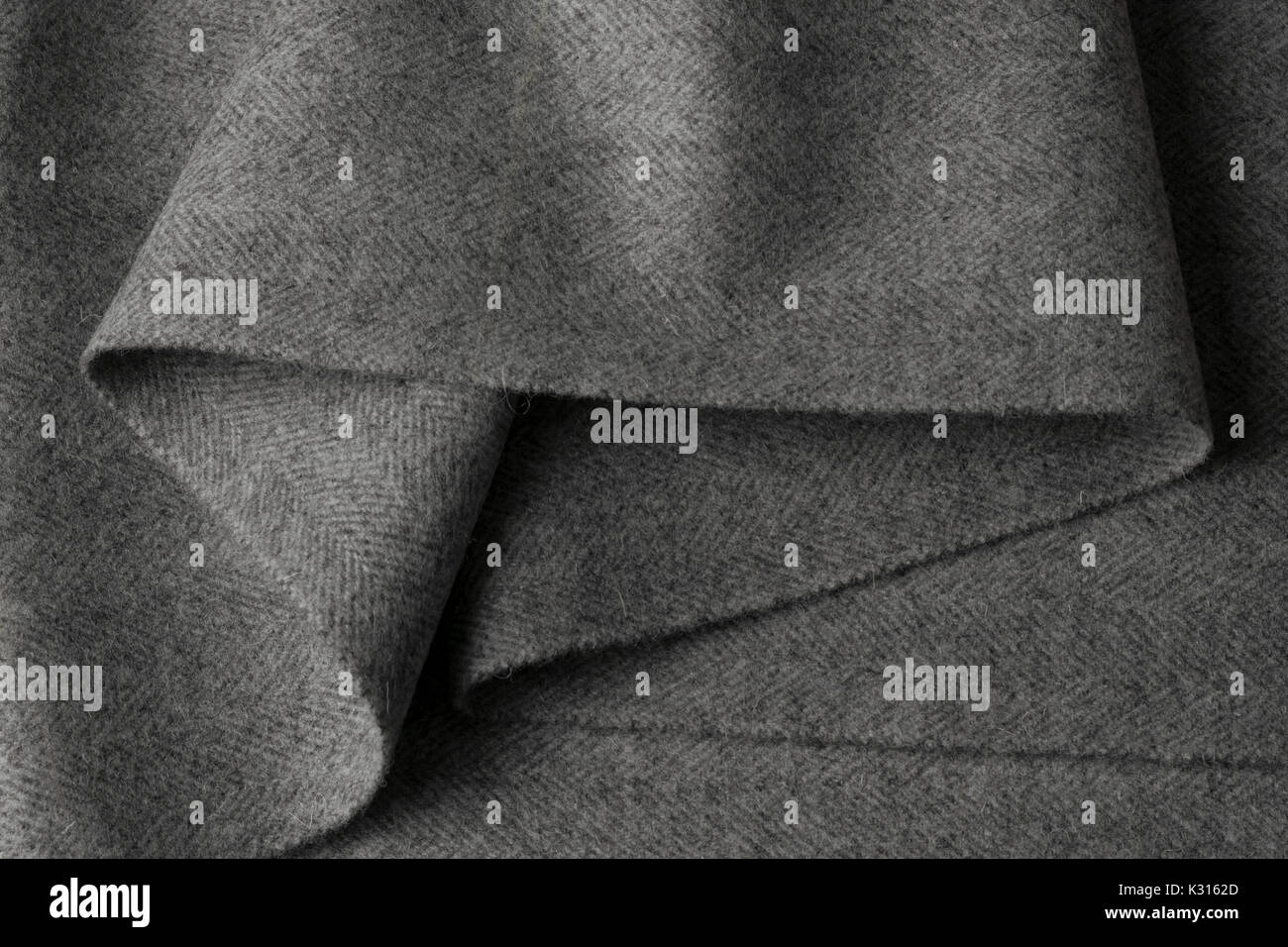Gray wool fabric, textile with patterns background Stock Photo - Alamy