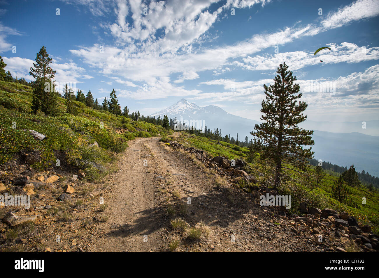 The paraglider is flying near the Whaleback launch close to Mount ...