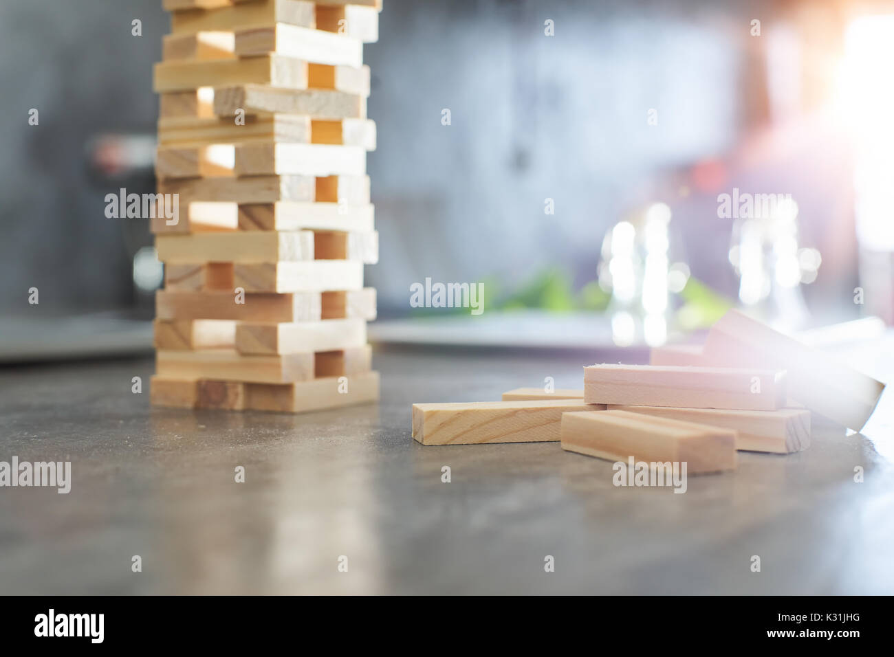 Brown wood building block tower with blur background .Selected focusing ...