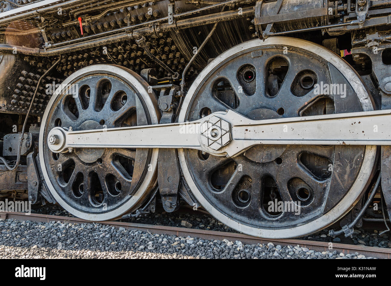 Two driver wheels, each over six feet in diameter on an old historic ...