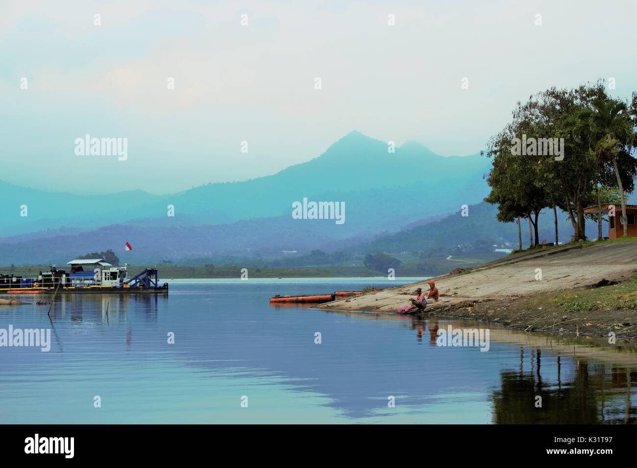 Selorejo lake tourist destination, in Malang Indonesia Stock Photo - Alamy
