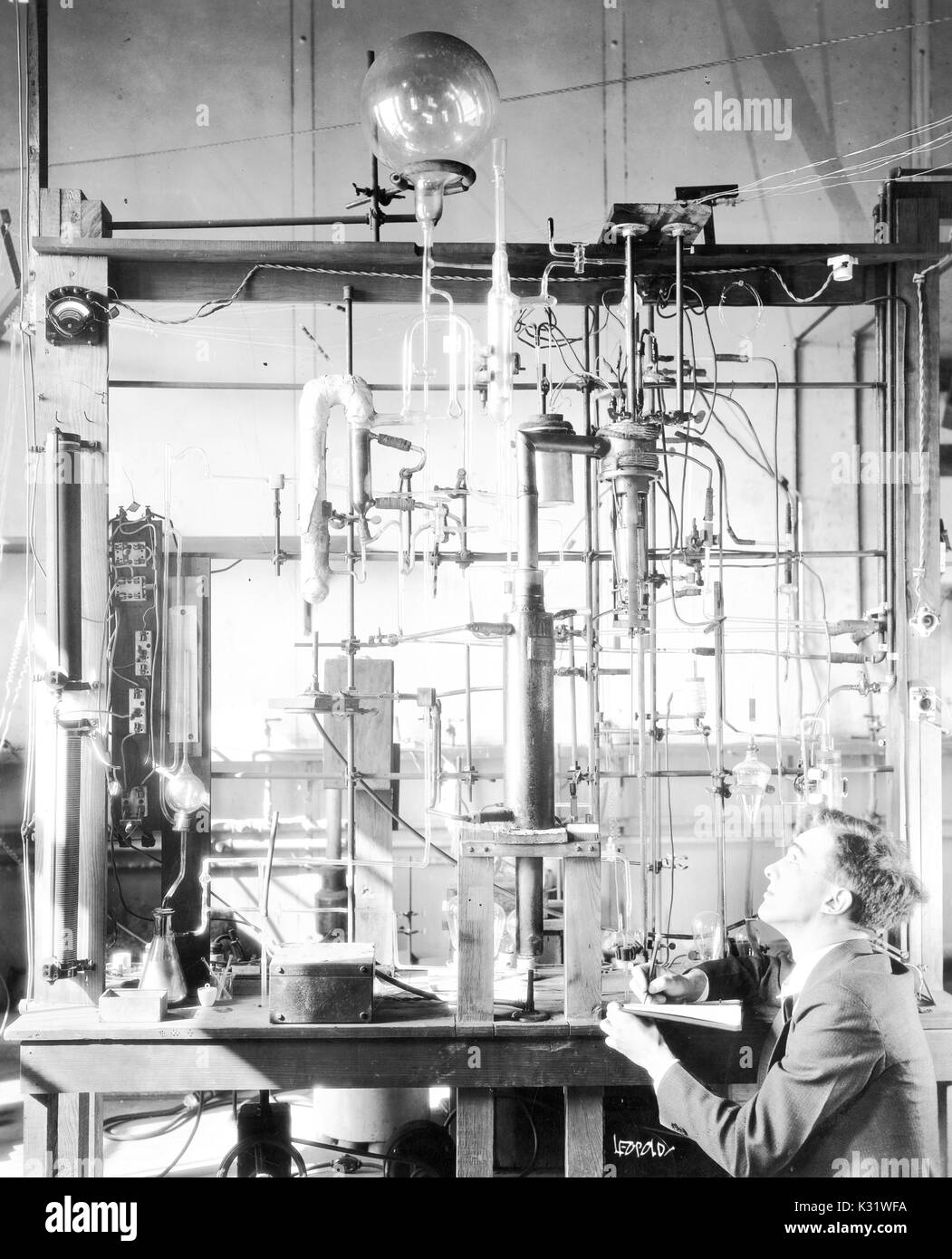 Student with equipment taking notes in a chemistry lab at Johns Hopkins ...