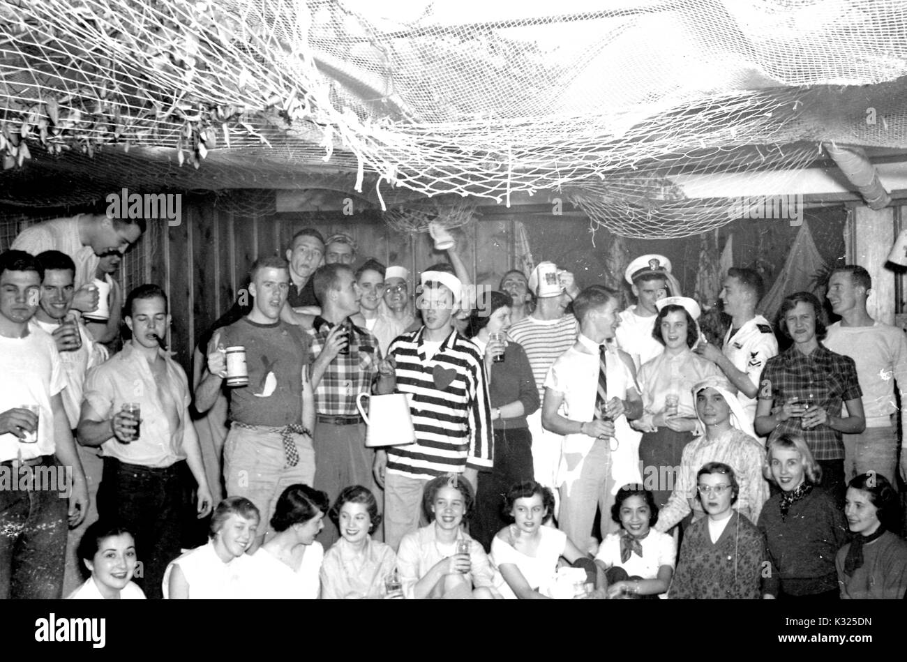 Fraternity brother drinking Black and White Stock Photos & Images - Alamy