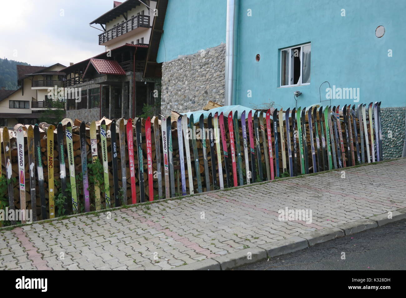 Colorful fence at chairlift, made of old skis in Borsa, Maramures ...