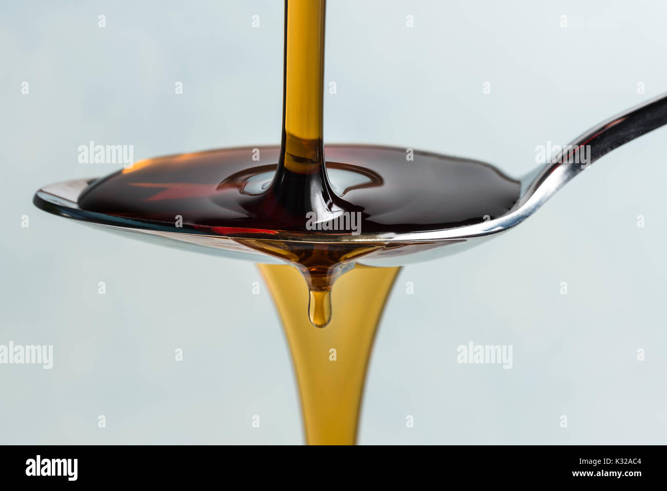 Maple Syrup in motion Stock Photo - Alamy
