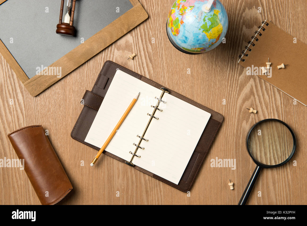 Flat lay design of travel concept. Traveler objects on wooden table ...