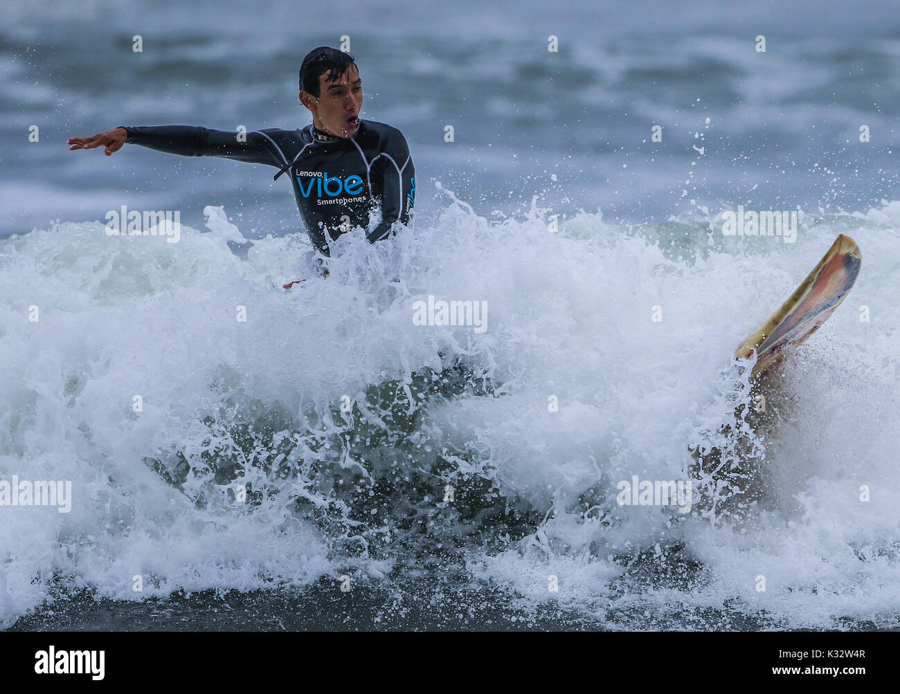 Surfing at Waikiki Beach in the tourist area of Miraflores in the ...