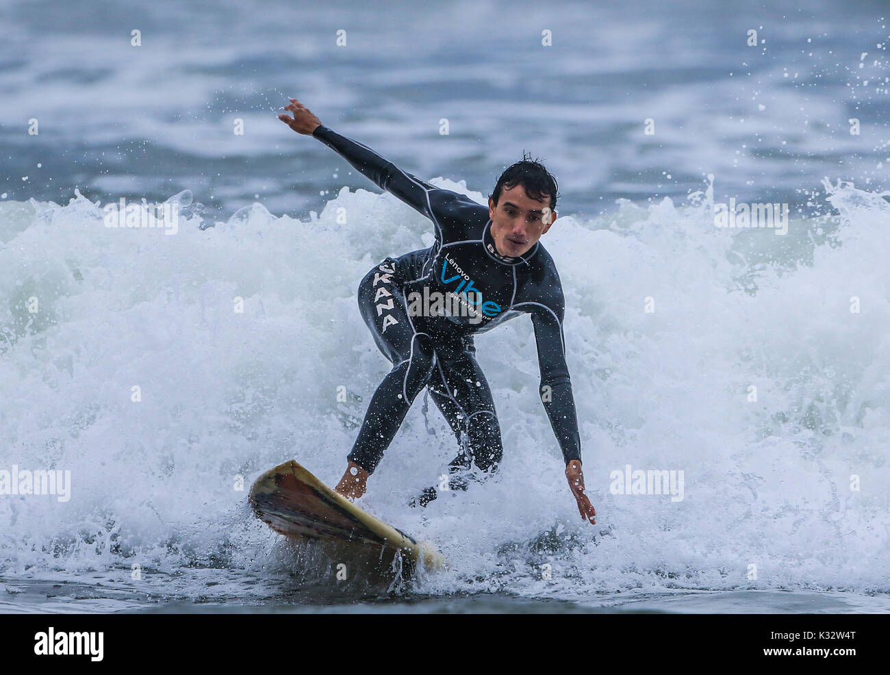 Surfing at Waikiki Beach in the tourist area of Miraflores in the ...