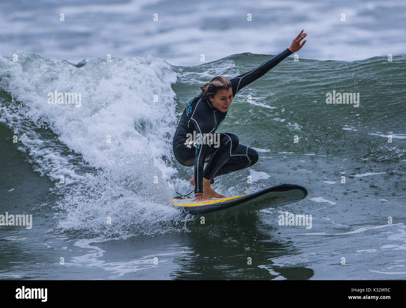 Surfing at Waikiki Beach in the tourist area of Miraflores in the ...