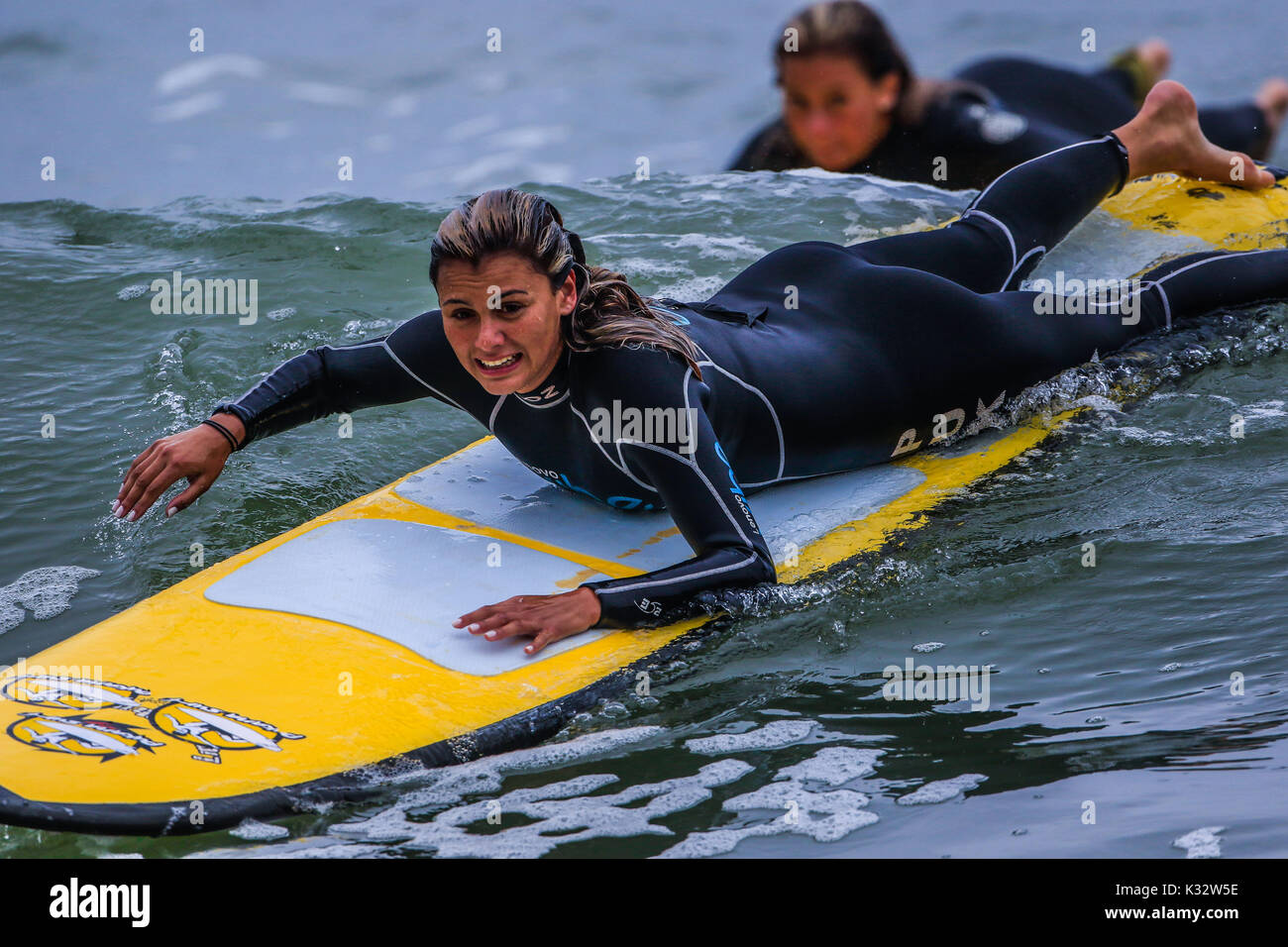 Surfing at Waikiki Beach in the tourist area of Miraflores in the ...