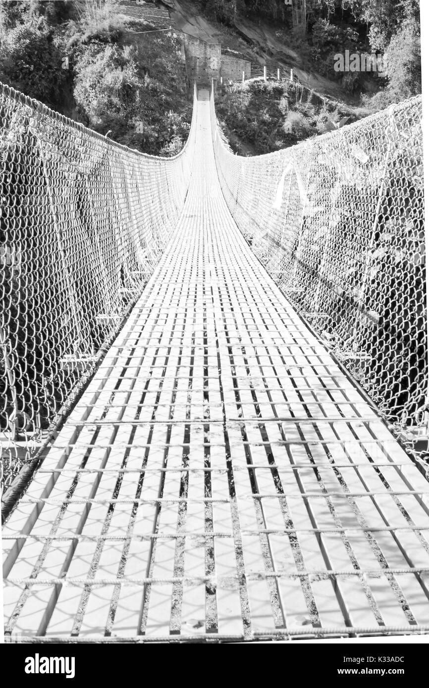 The Chomrong suspended bridge, on the Annapurna Base Camp Trek, Nepal ...