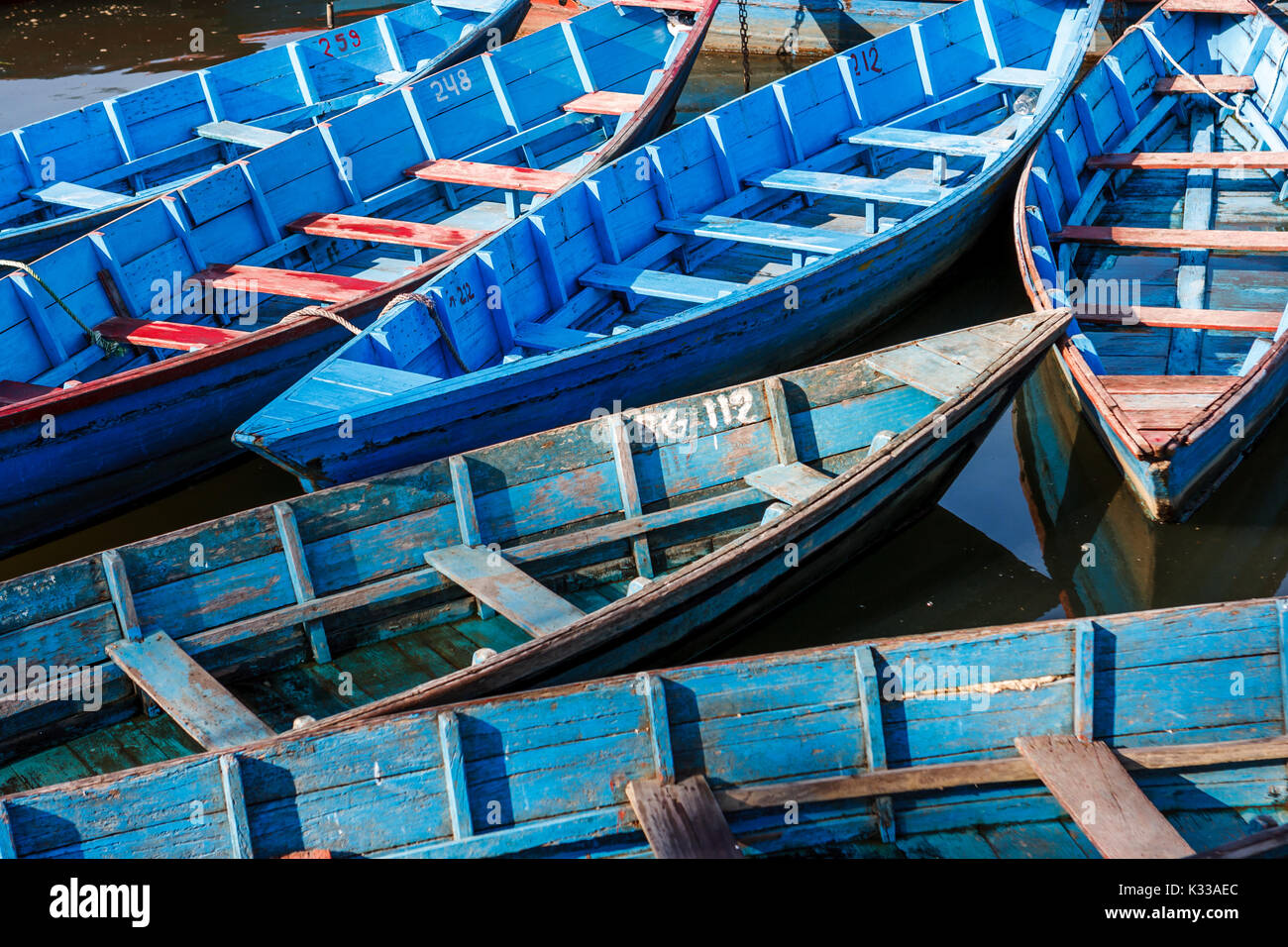 Small wooden colored boats on the Phewa Lake, Pokhara, Nepal Stock ...