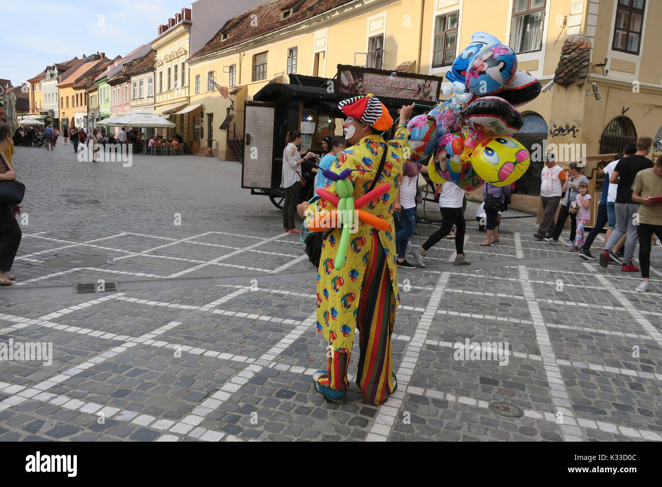 Clown with lots of baloons on a square of Brasov city, Romania Stock ...