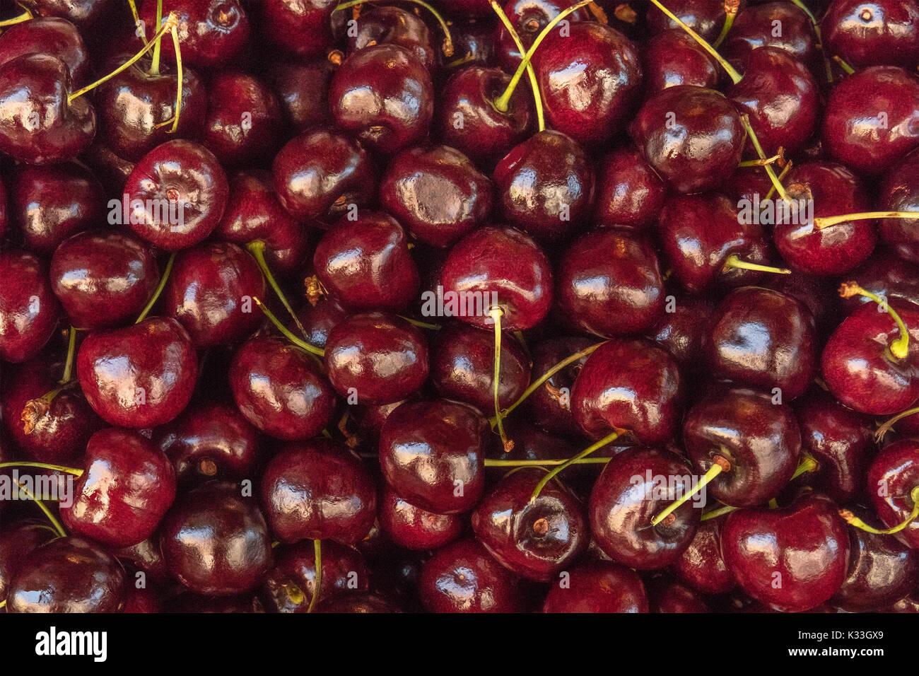Background texture of vibrant fresh cherries at a market Stock Photo ...