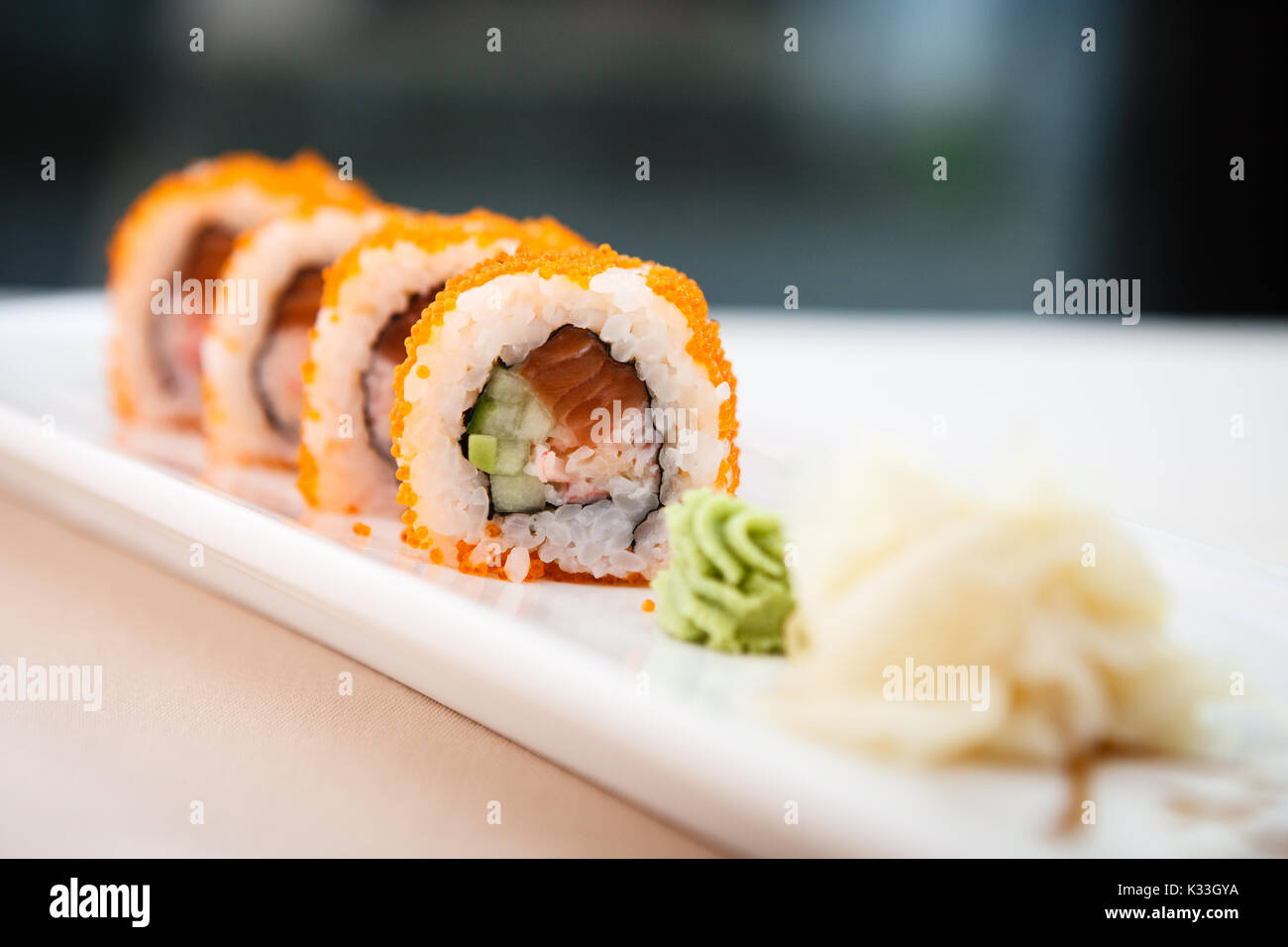 Flying fish roe maki Stock Photo - Alamy