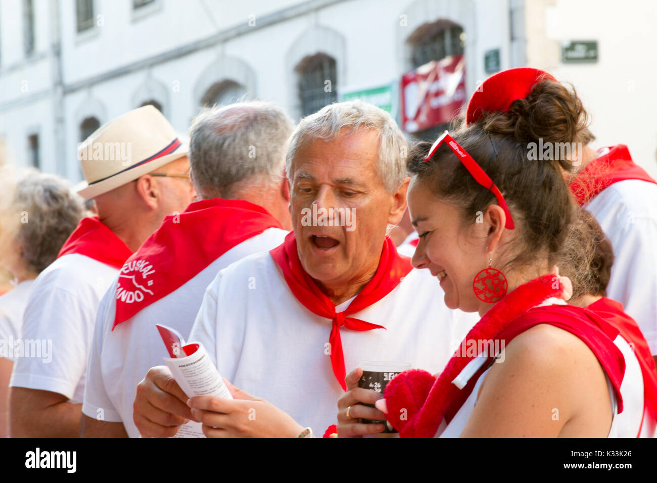 BAYONNE, FRANCE - JULY31: Unknown people dresses in traditional red and ...