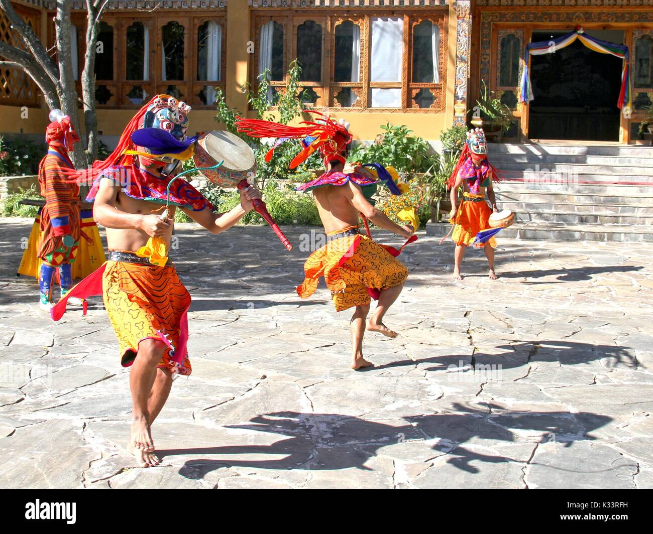 PARO, BHUTAN - November10, 2012 : Bhutanese dancers with colorful mask ...