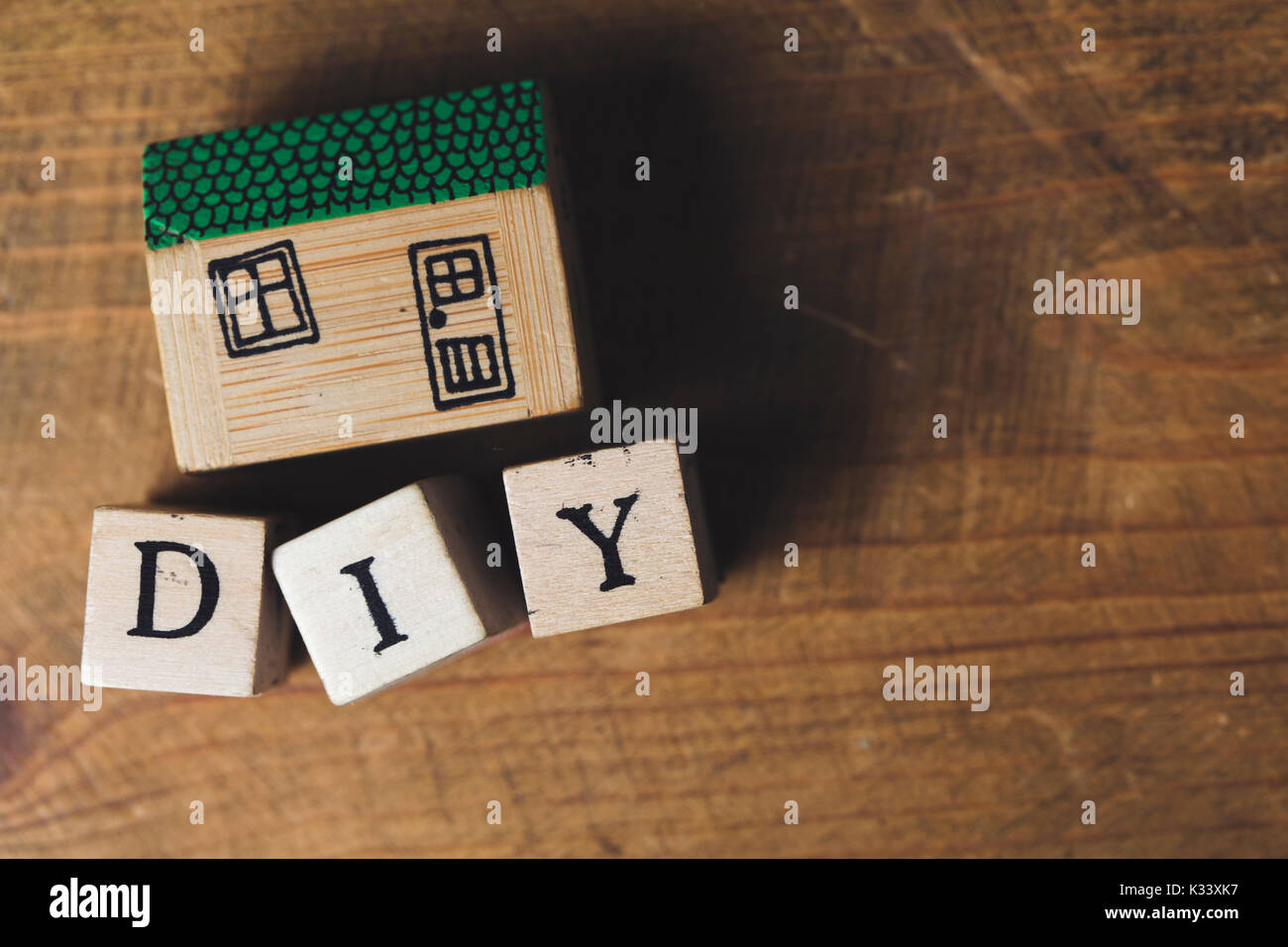 House model with DIY word made from wooden blocks Stock Photo - Alamy