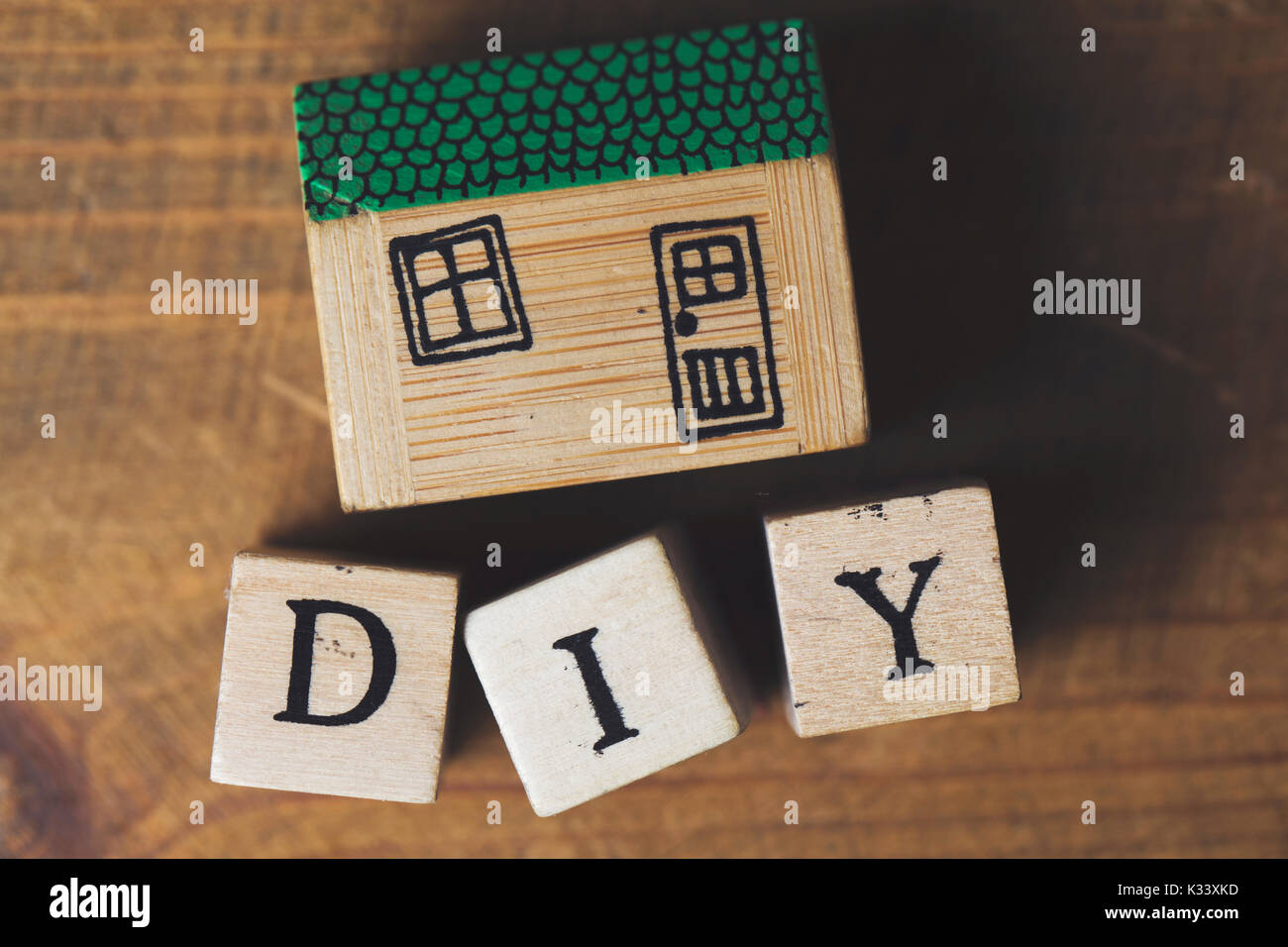 House model with DIY word made from wooden blocks Stock Photo - Alamy