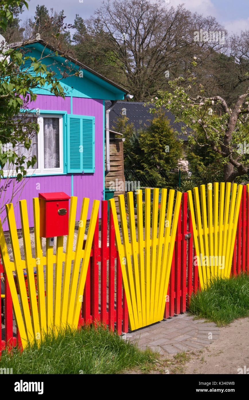 Colourful garden fence Stock Photo - Alamy
