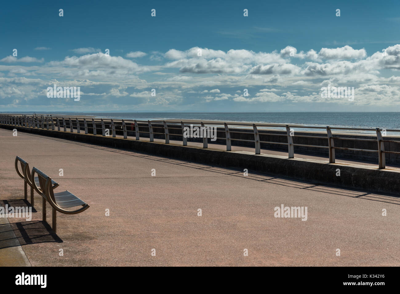 Empty seating beaches looking out to sea across the beach on a sunny ...