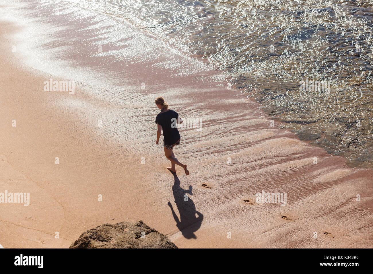 Running along coastline hi-res stock photography and images - Alamy