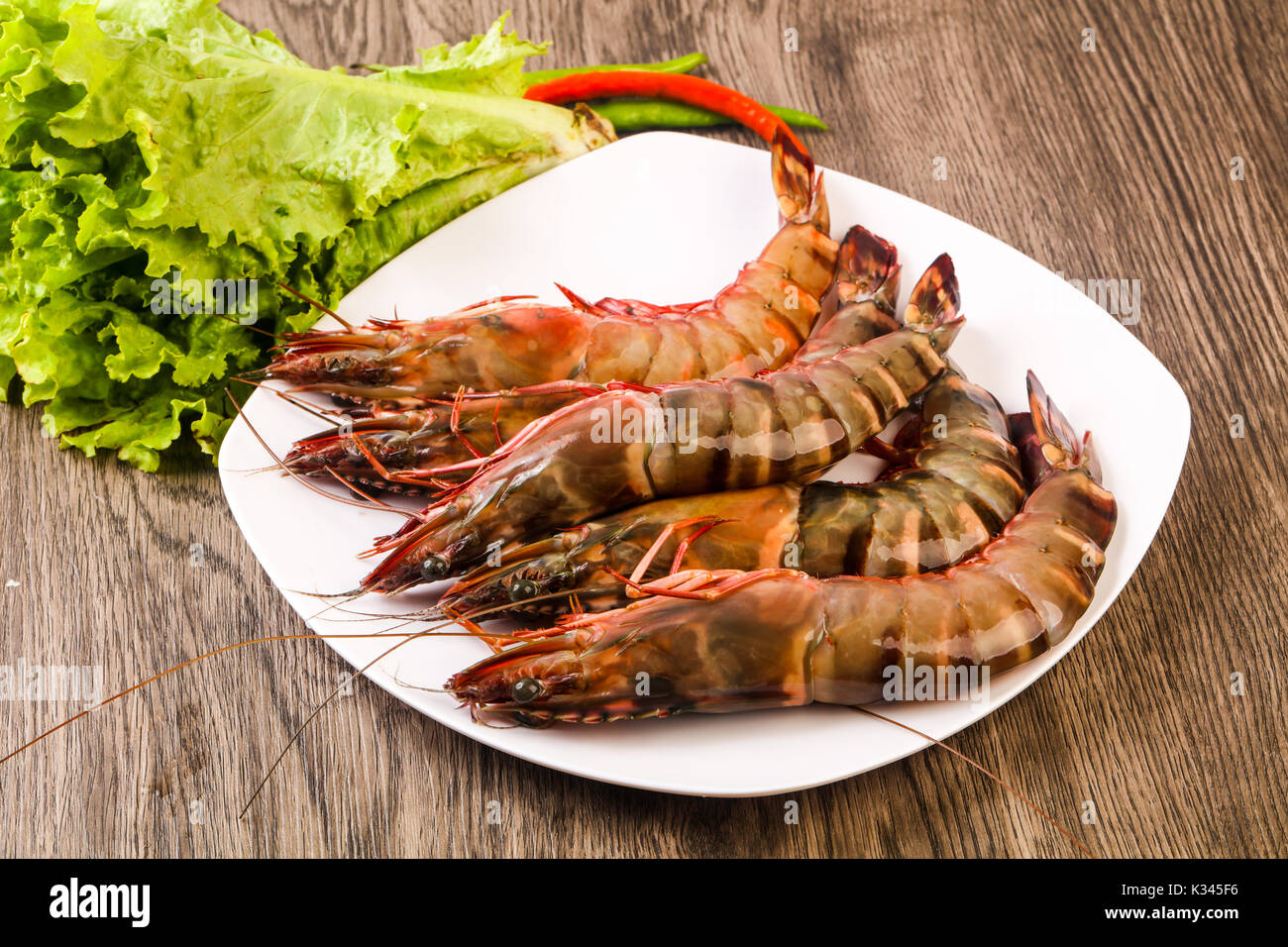 Raw big tiger prawn - ready for cooking Stock Photo - Alamy