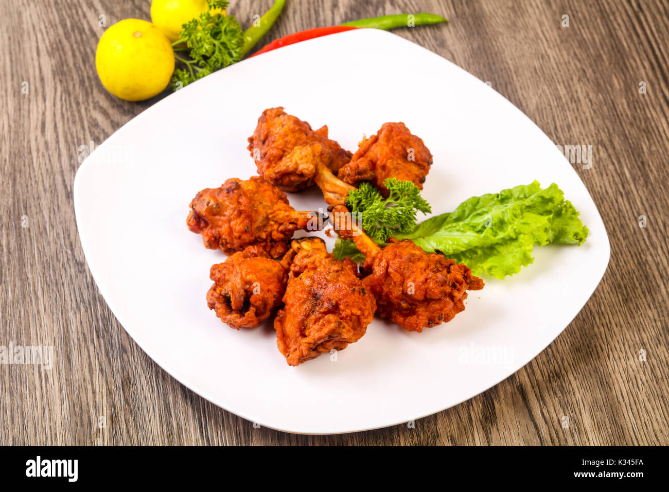 Indian traditional cuisine - Chicken lollipops with spices Stock Photo ...
