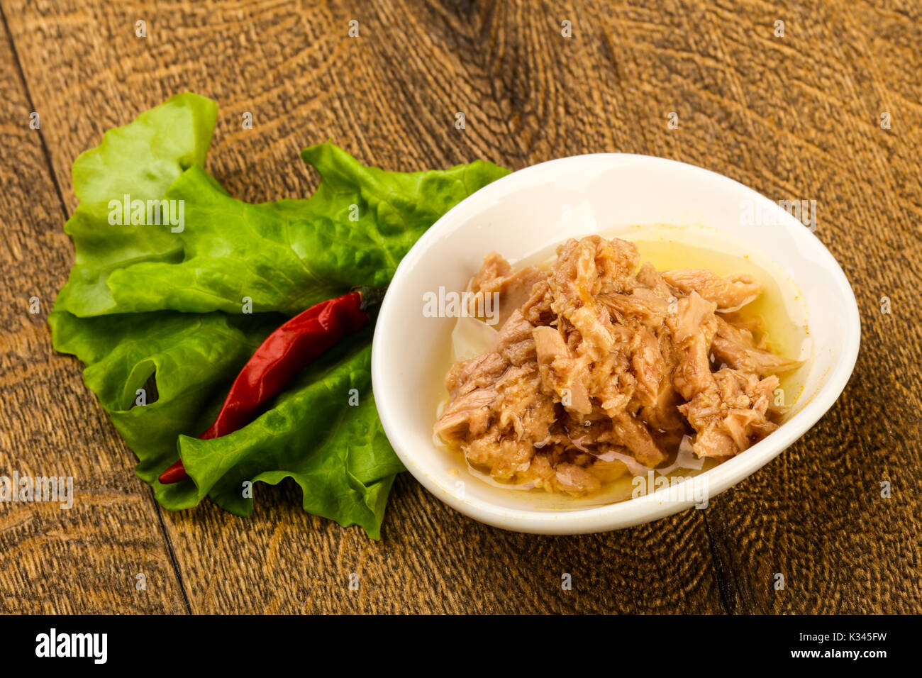 Canned tuna fish in the bowl ready for cooking Stock Photo - Alamy