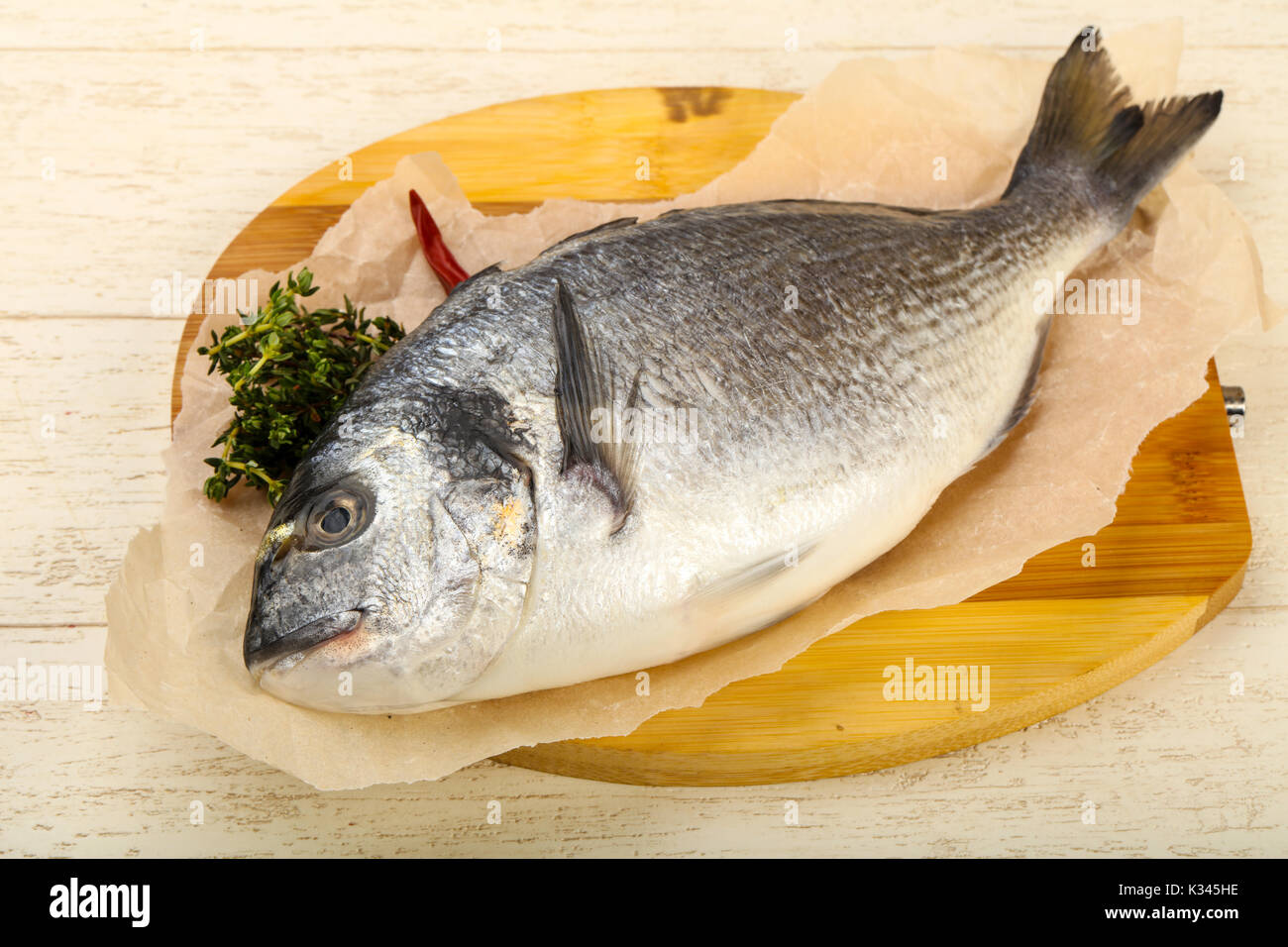 raw dorada fish - ready for cooking Stock Photo - Alamy