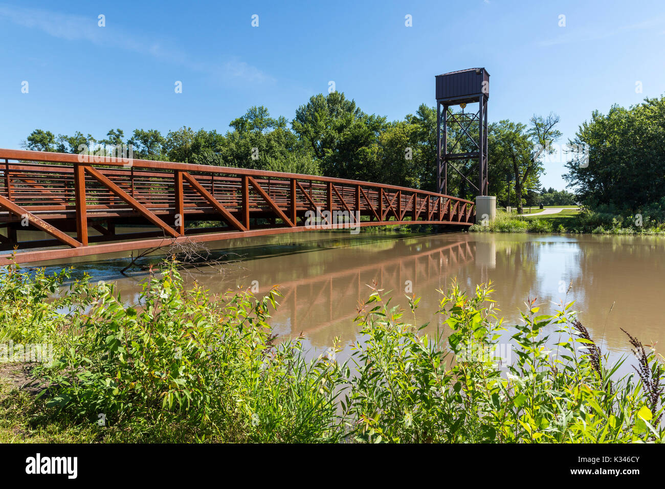 Footbridge Over Red River Stock Photo - Alamy