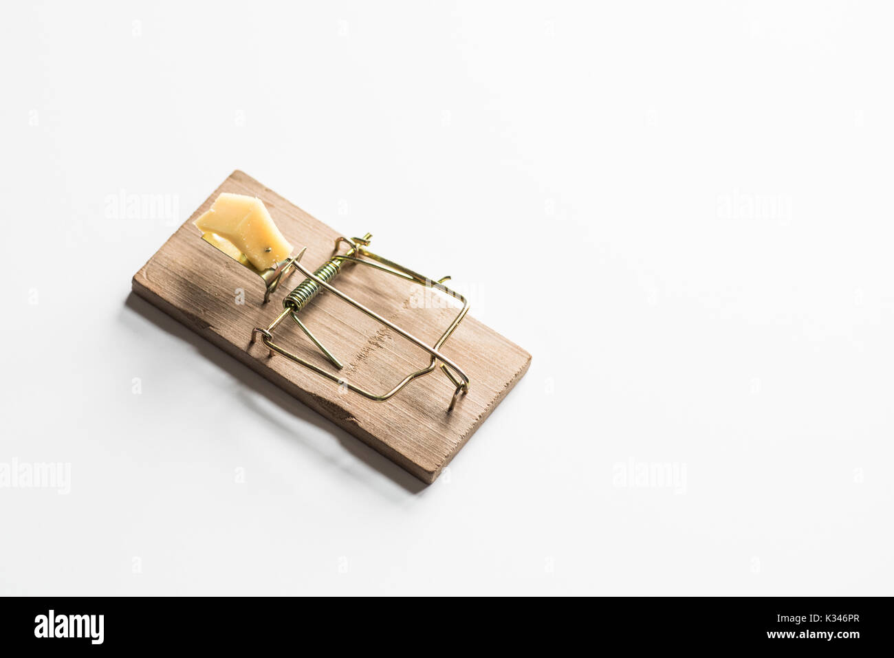 Mouse trap with cheese isolated on white Stock Photo - Alamy