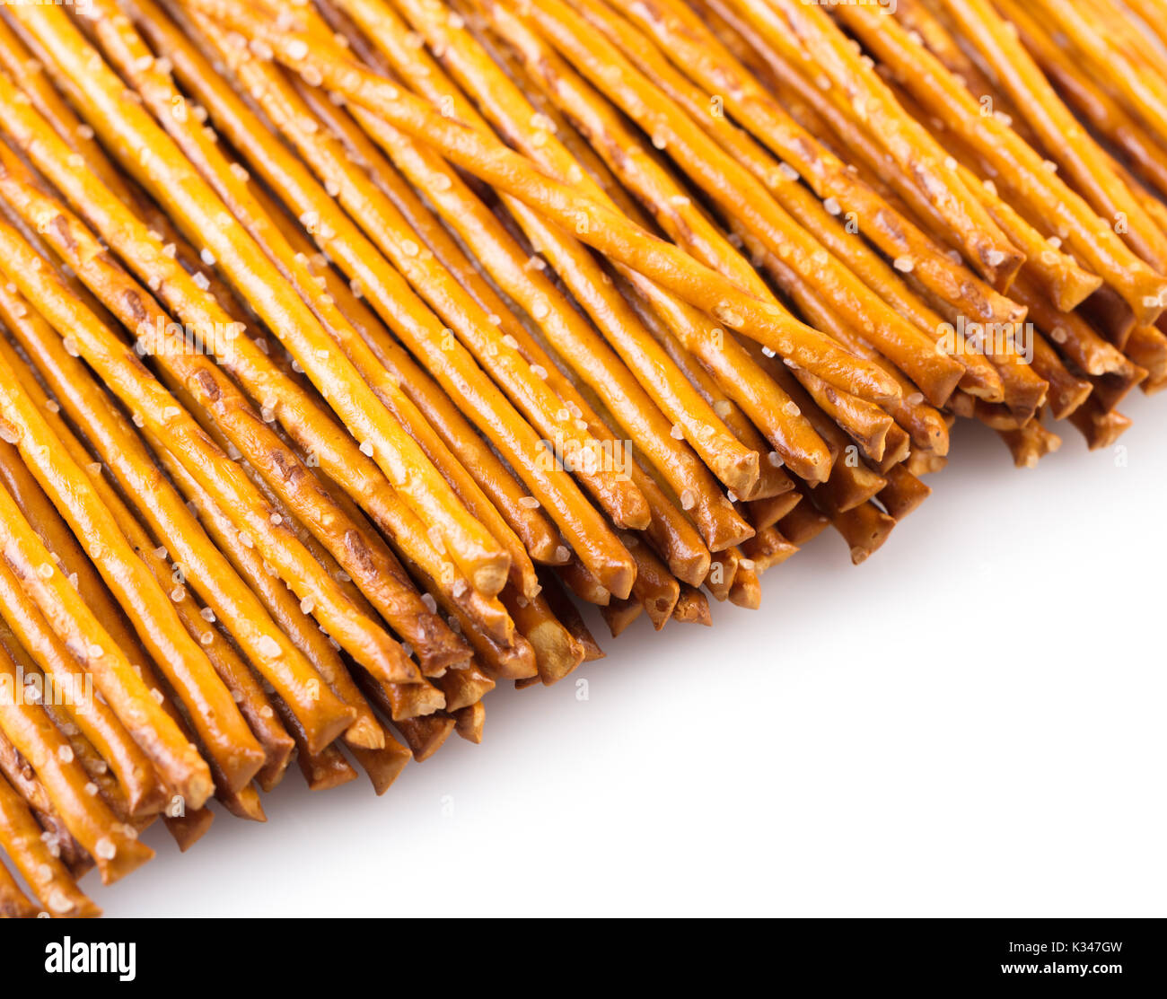 Food background from a texture of salted straws Stock Photo - Alamy