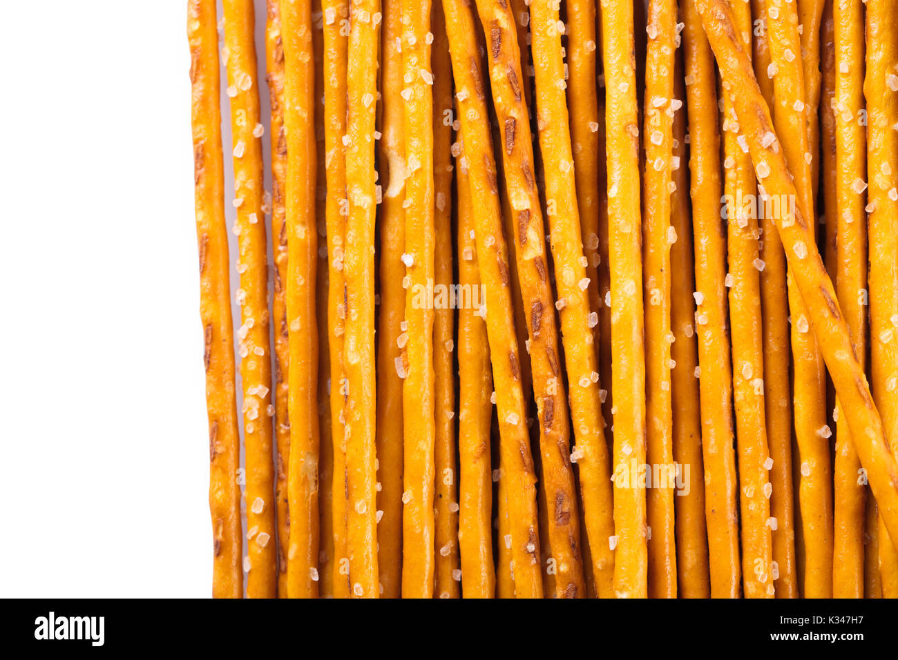 Food background from a texture of salted straws Stock Photo - Alamy