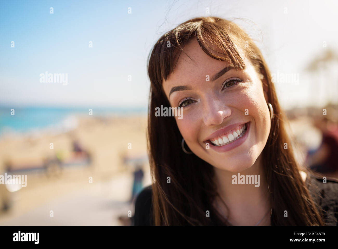 A beautiful woman smirking hi-res stock photography and images - Alamy