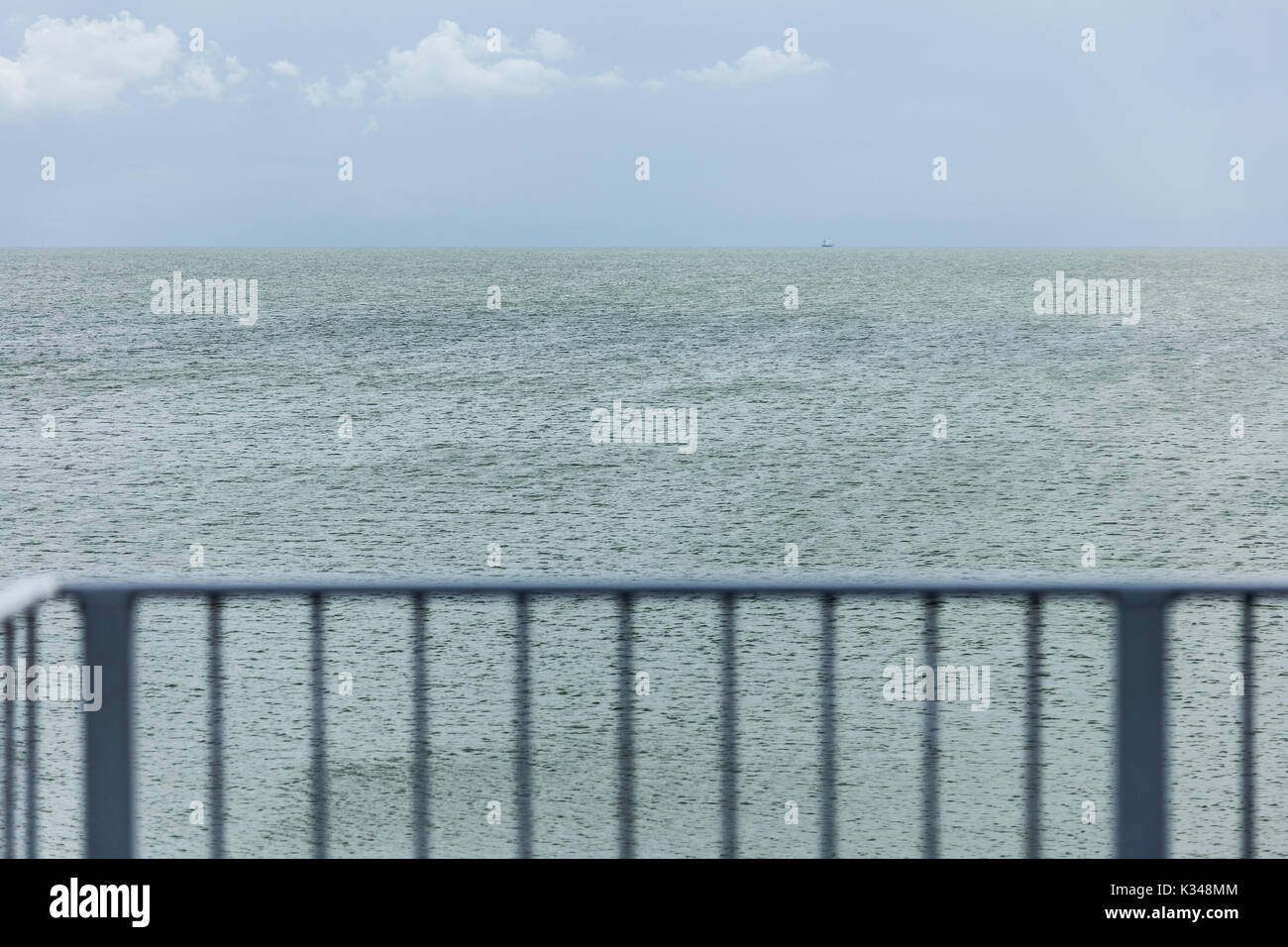 Metal railing on the sea Stock Photo - Alamy