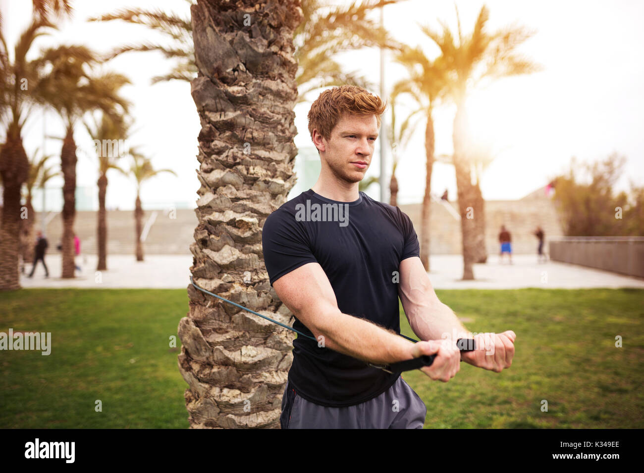 A photo of young, muscular man training with determination Stock Photo ...