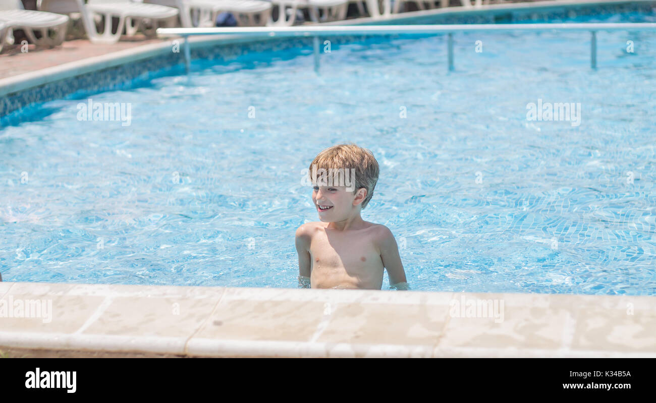 Cheerful swimmer boy hi-res stock photography and images - Alamy