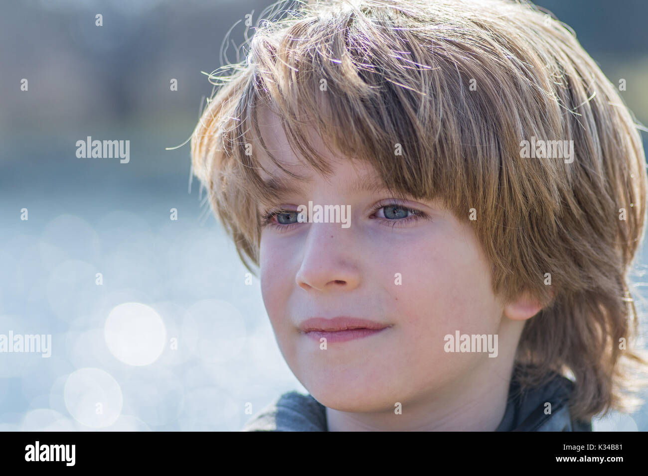 Portrait of a boy with blurred background Stock Photo - Alamy