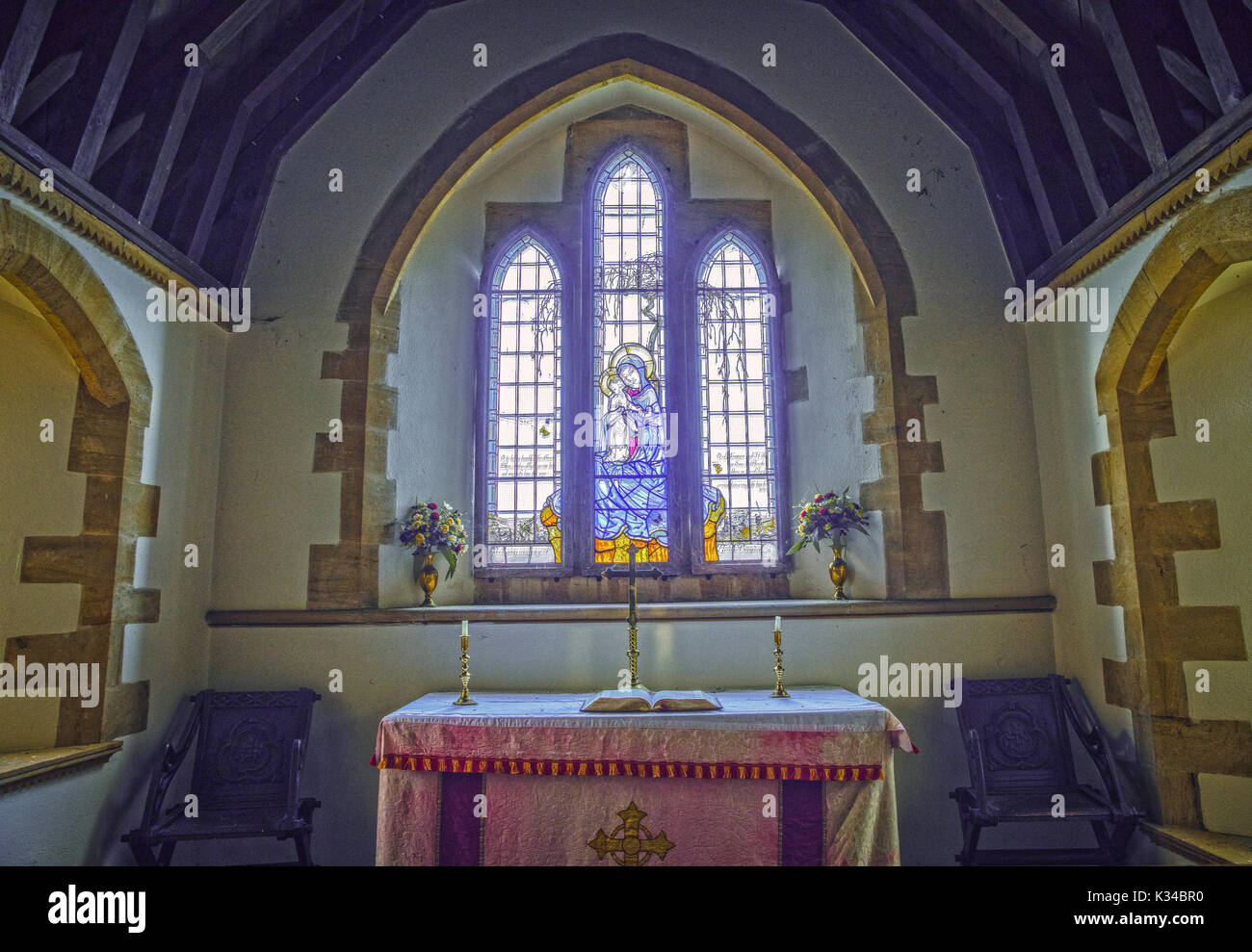 Stained Glass Window and Altar Stock Photo - Alamy